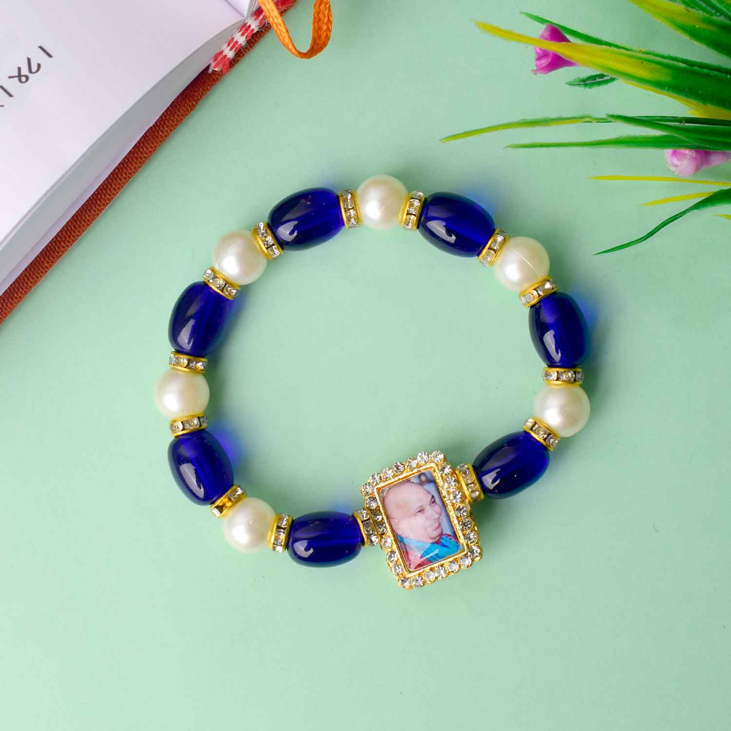 Buy Elegant Guruji Swaroop Bracelet – Blue & White Pearls in India at ...